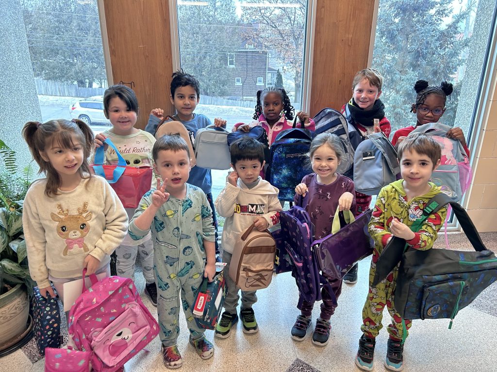 Backpacks bring smiles to students in Rainbow Schools - Rainbow ...