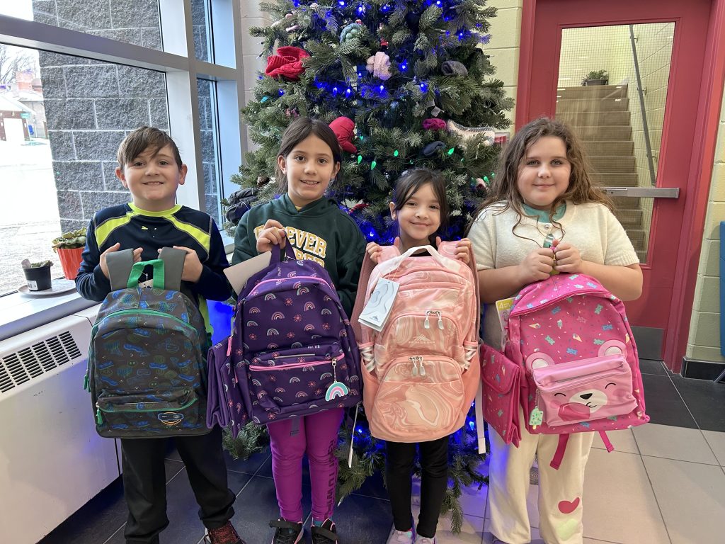 Backpacks bring smiles to students in Rainbow Schools - Rainbow ...